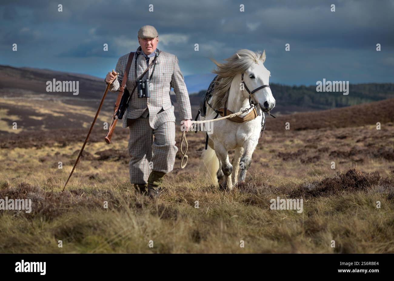 Game keeper on the Atholl Estate with pony which he would use to carry ...
