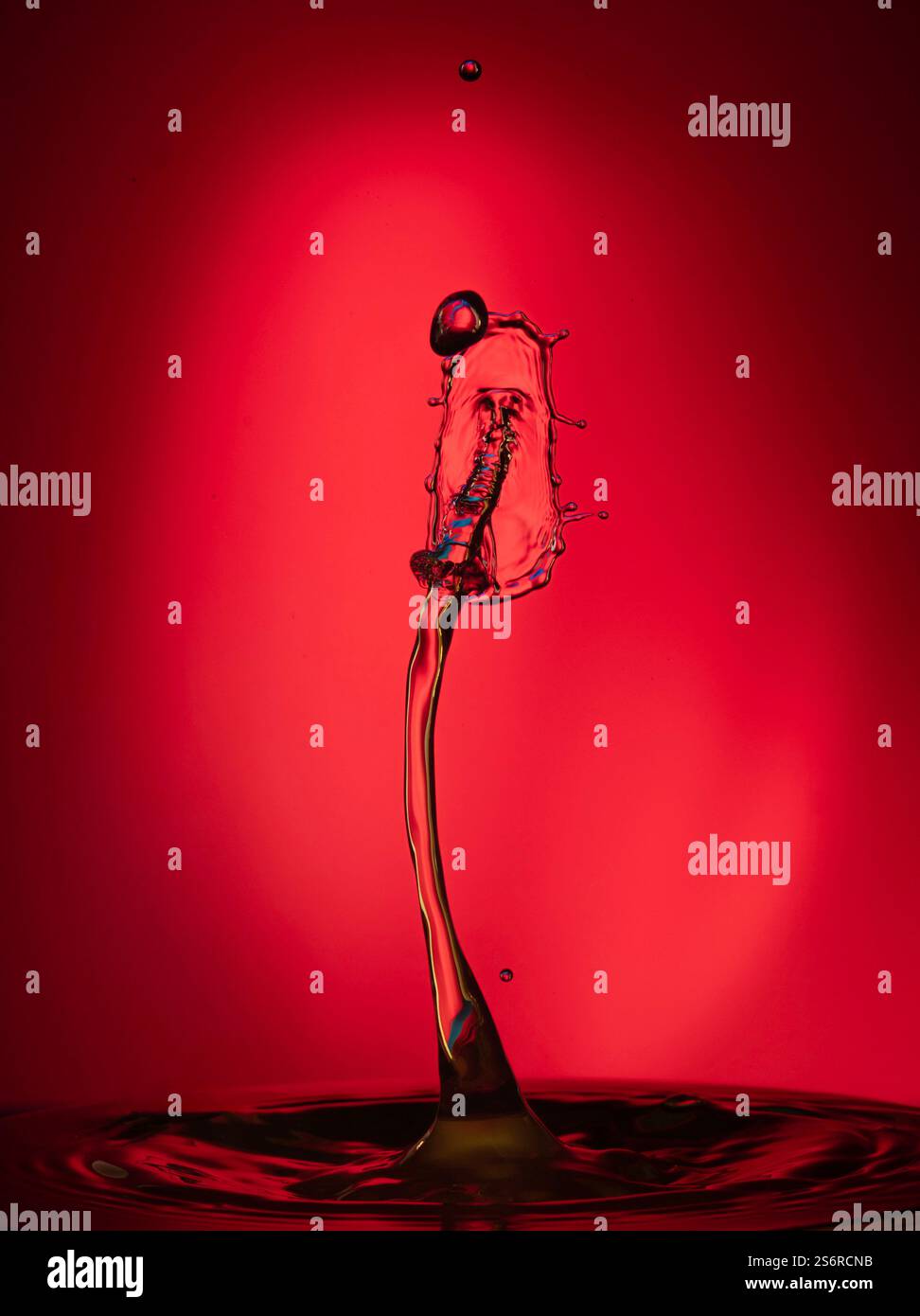 Arresting, ethereal, colour infused, imaginative water collision, macro ...