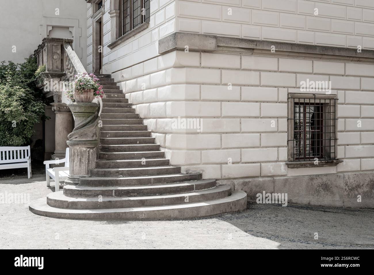 The winding staircase of a historical castle features stone steps and ...