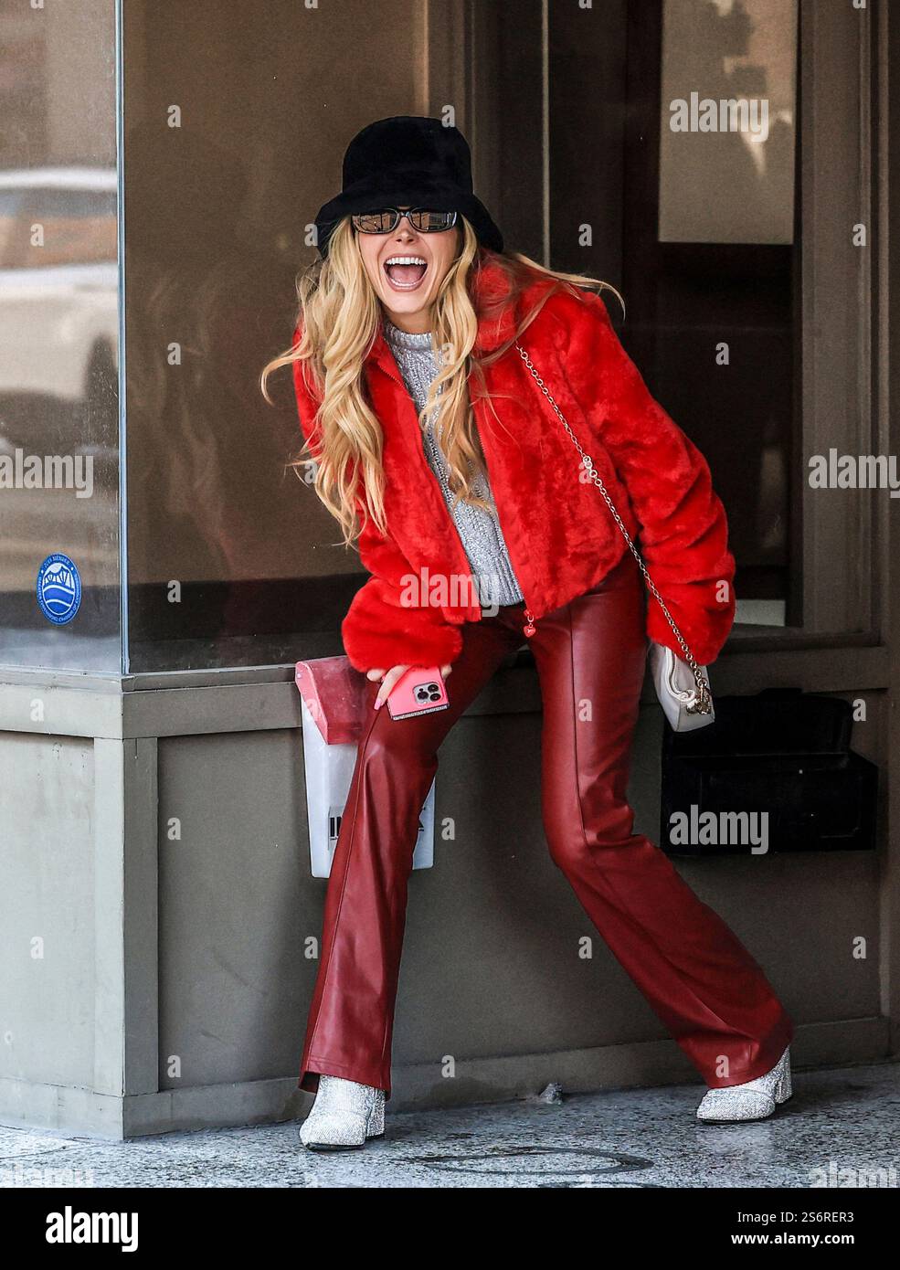 Actress Grace Patterson reacts while filming a segment of a scene in ...