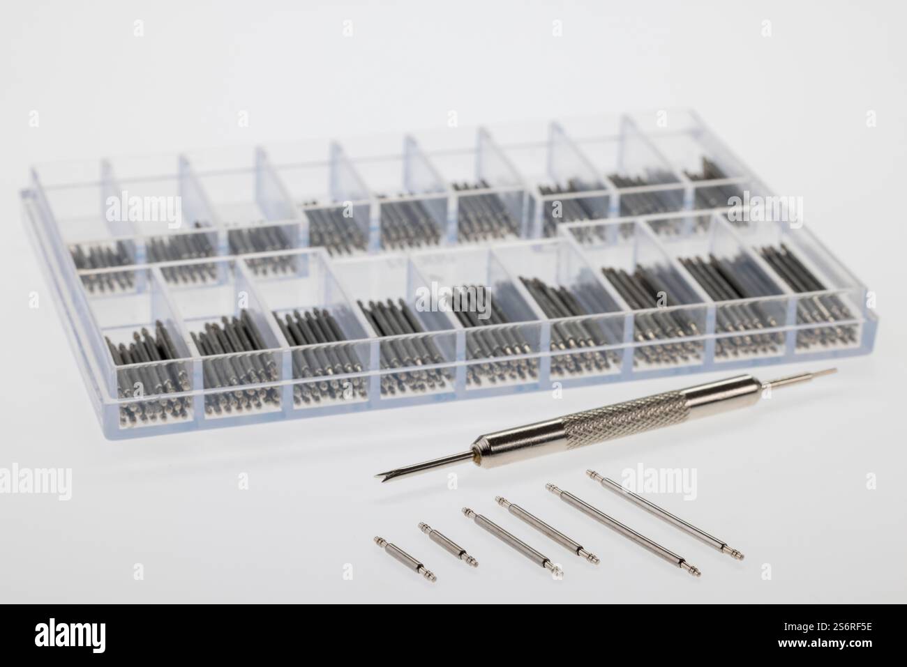 Spring bar tool and spring bars in different sizes in a plastic box ...