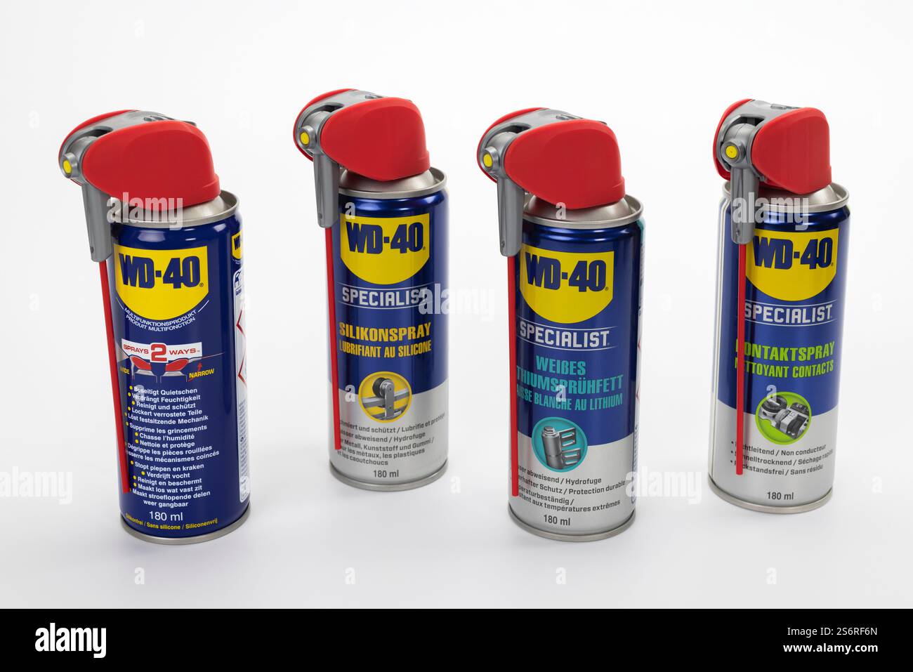 Four spray cans of WD-40, WD-40 Smart Straw multifunctional spray ...