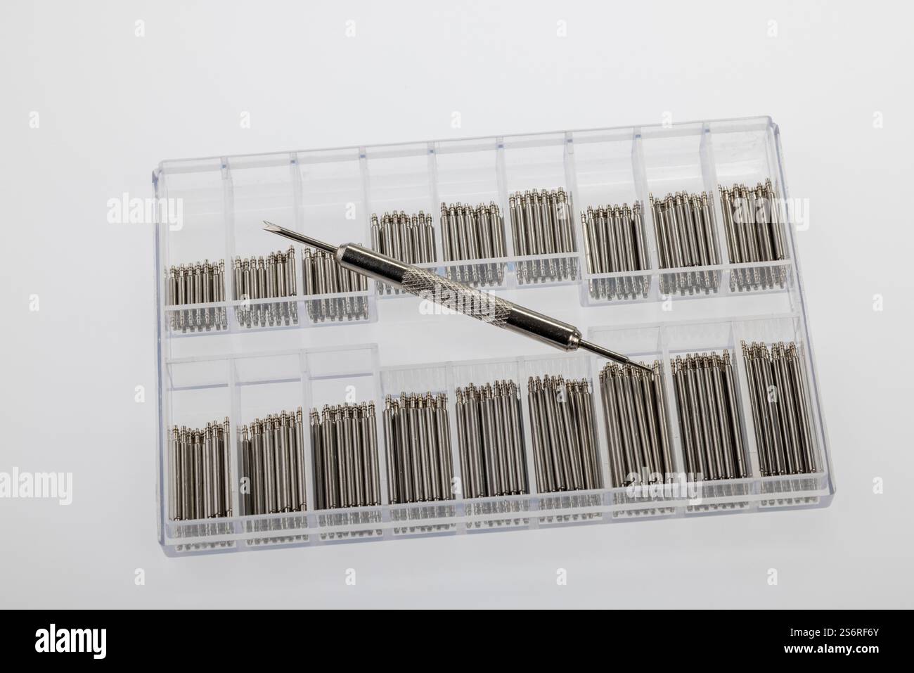 Spring bar tool and spring bars in different sizes in a plastic box ...