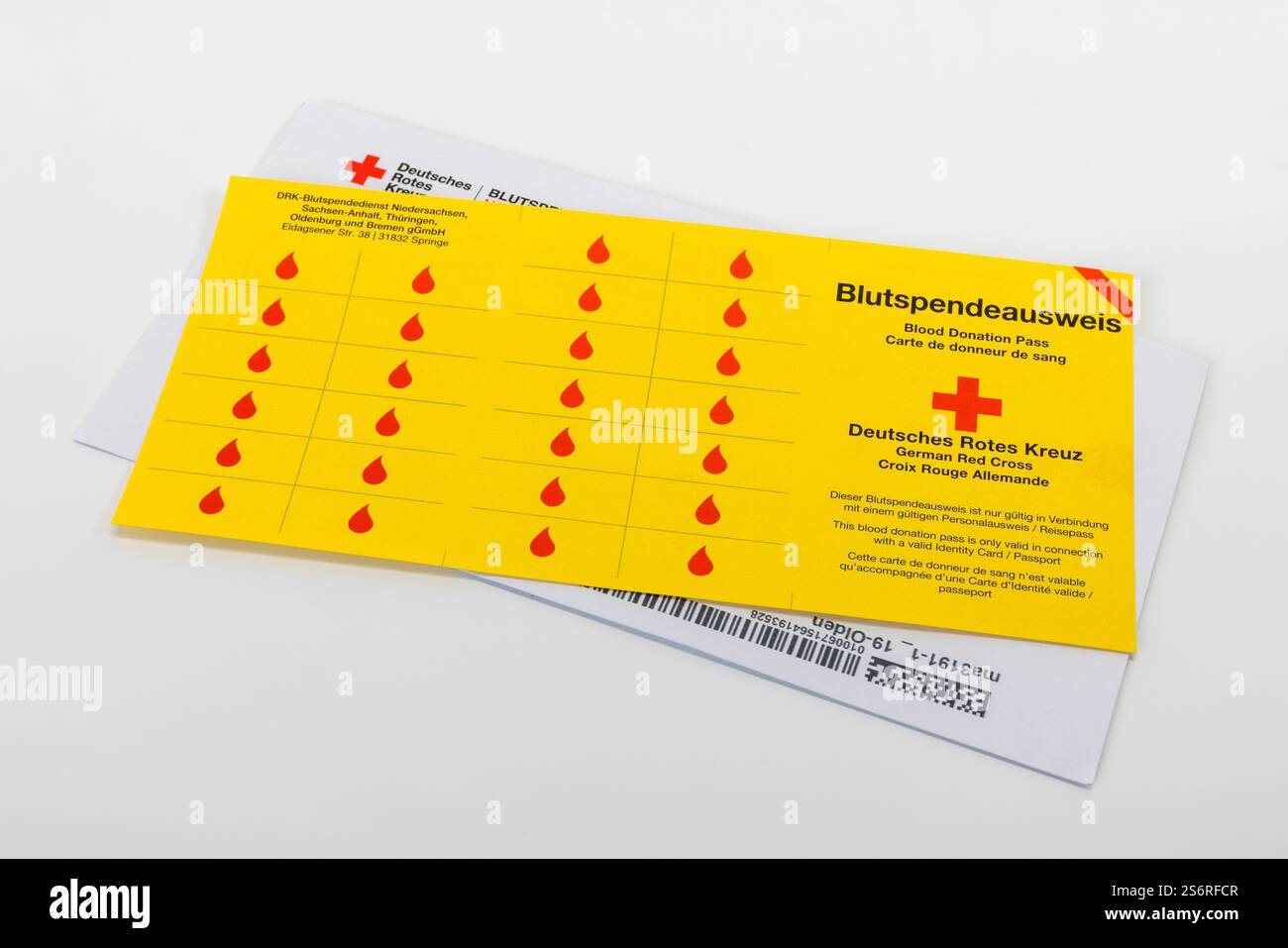 Envelope with German Red Cross logo, new blood donor card, white ...