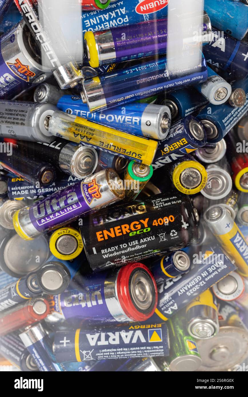Used batteries, various sizes and brands, collection container, detail ...