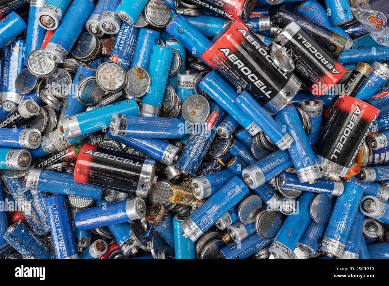 Used batteries in plastic container, detail, different sizes and brands ...