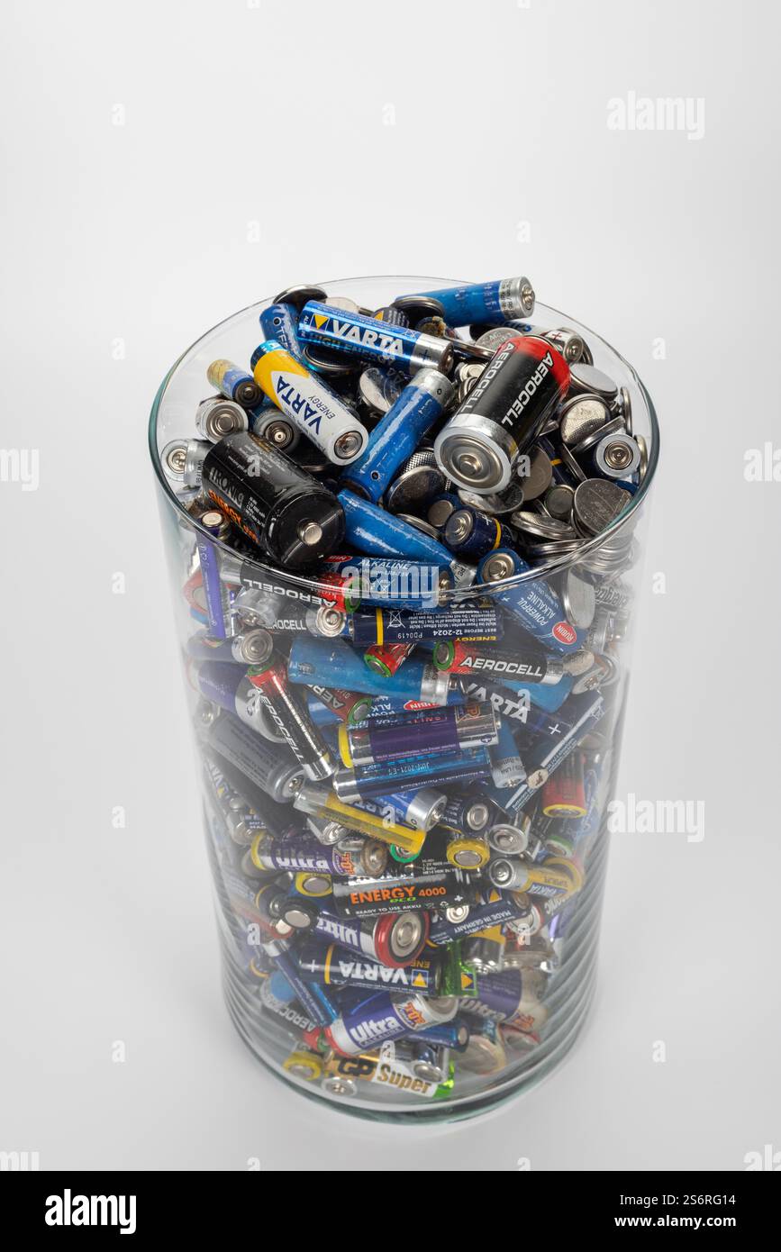 Used batteries, various sizes and brands, collection container, detail ...