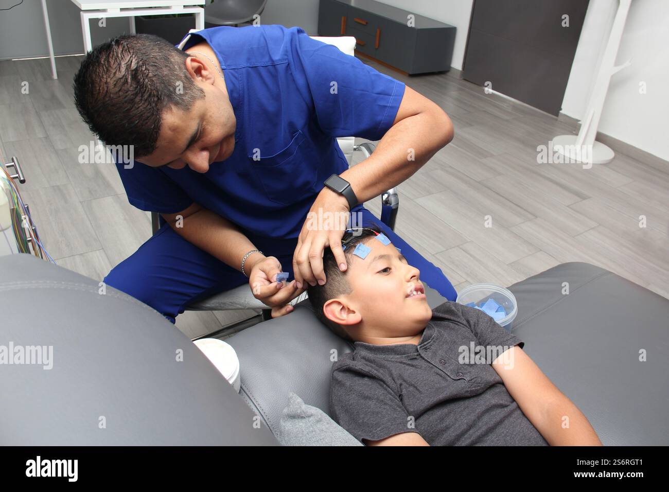 EEG electroencephalogram to record the electrical activity of the brain ...
