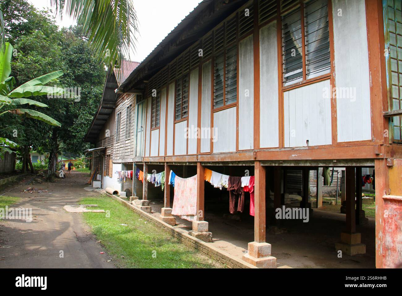 Old traditional Malay wooden house raised off the ground on wooden ...