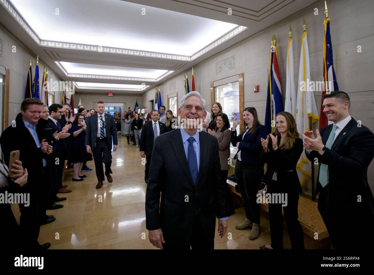 Attorney General Merrick Garland receives a "clap out" from Department ...