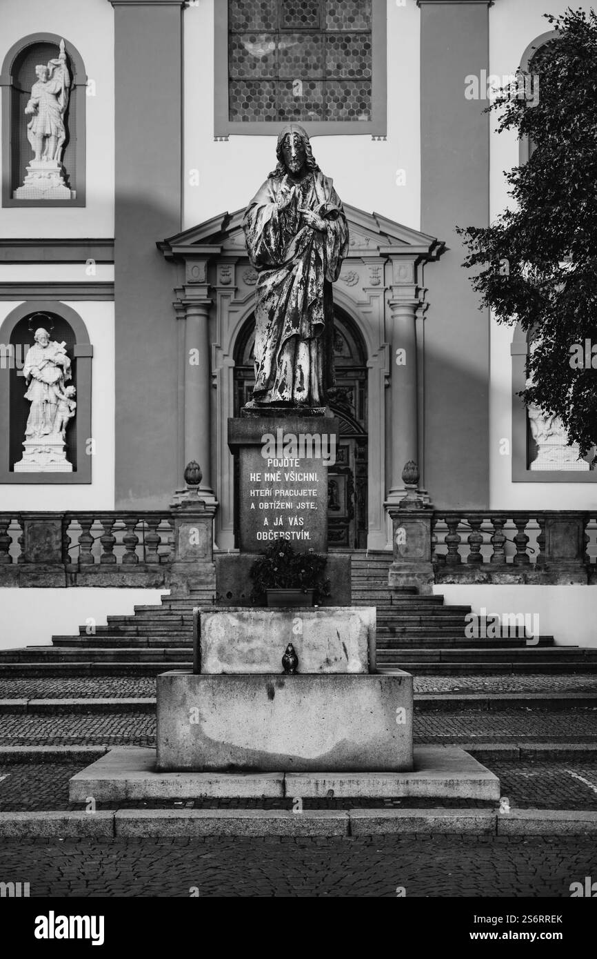 Statue outside church in Black and White Stock Photos & Images - Alamy