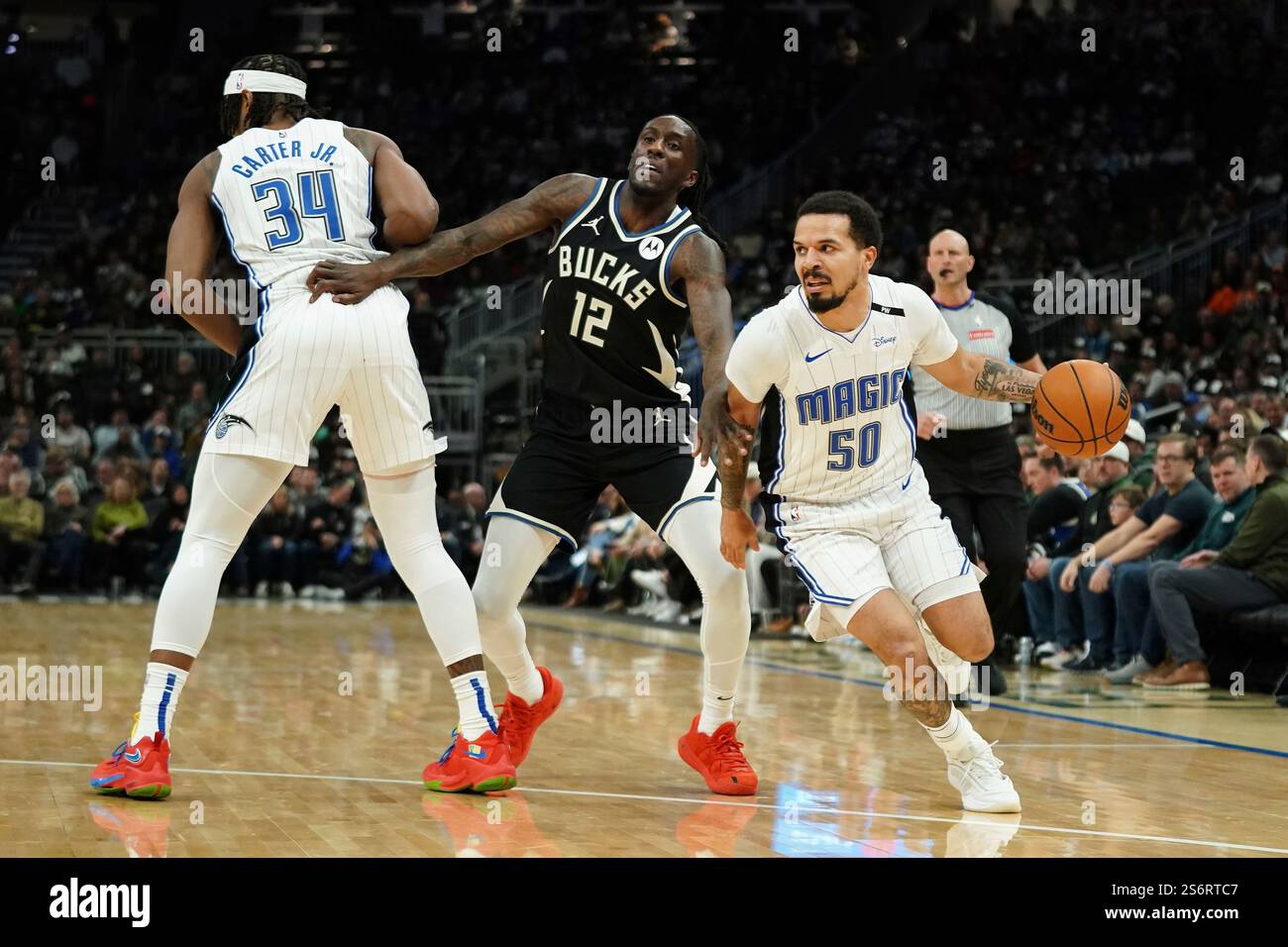 Orlando Magic's Cole Anthony drives to the basket around Milwaukee ...
