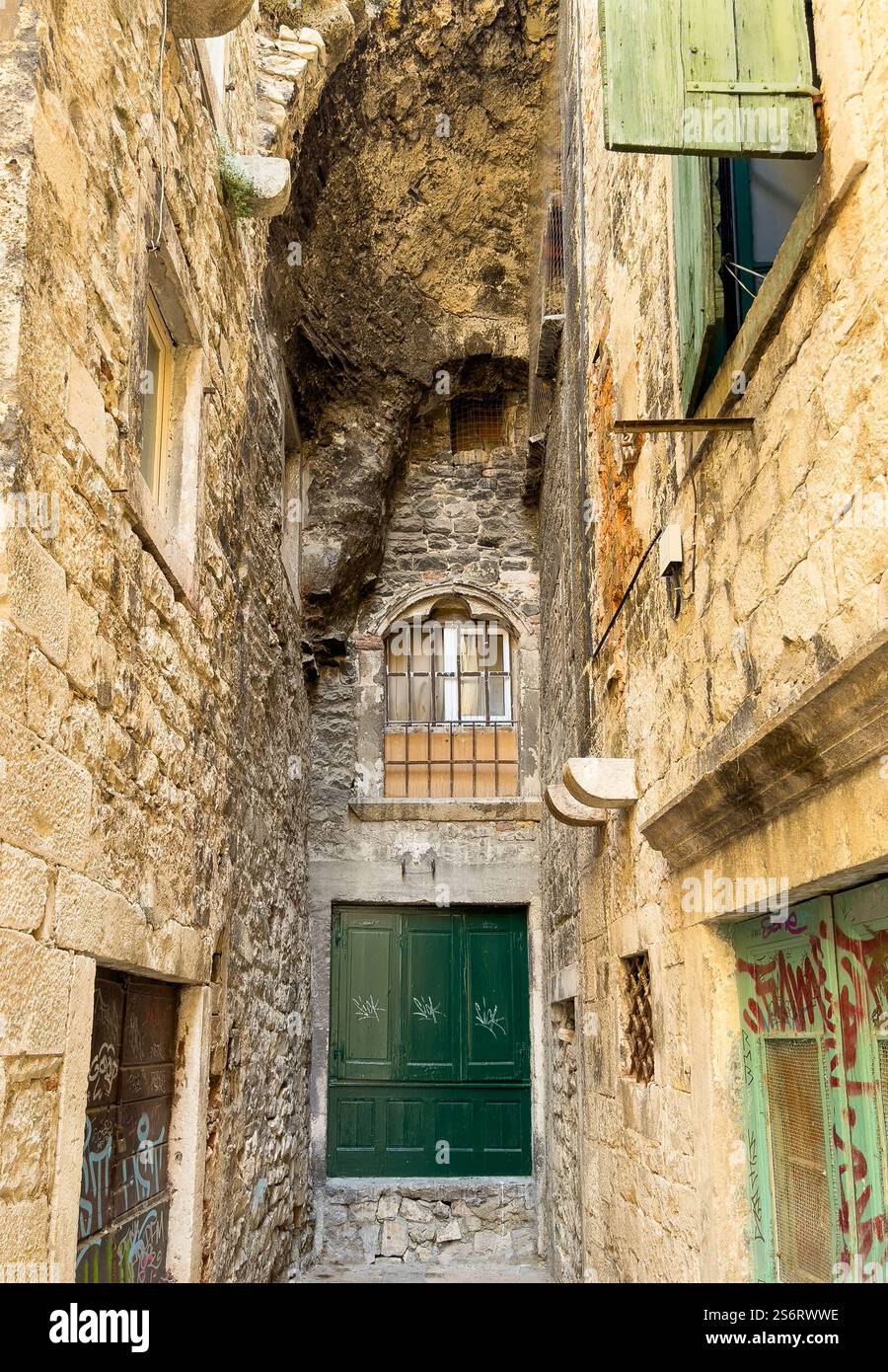Split, Croatia - July 1, 2024: Historic downtown. Ancient stone wall ...