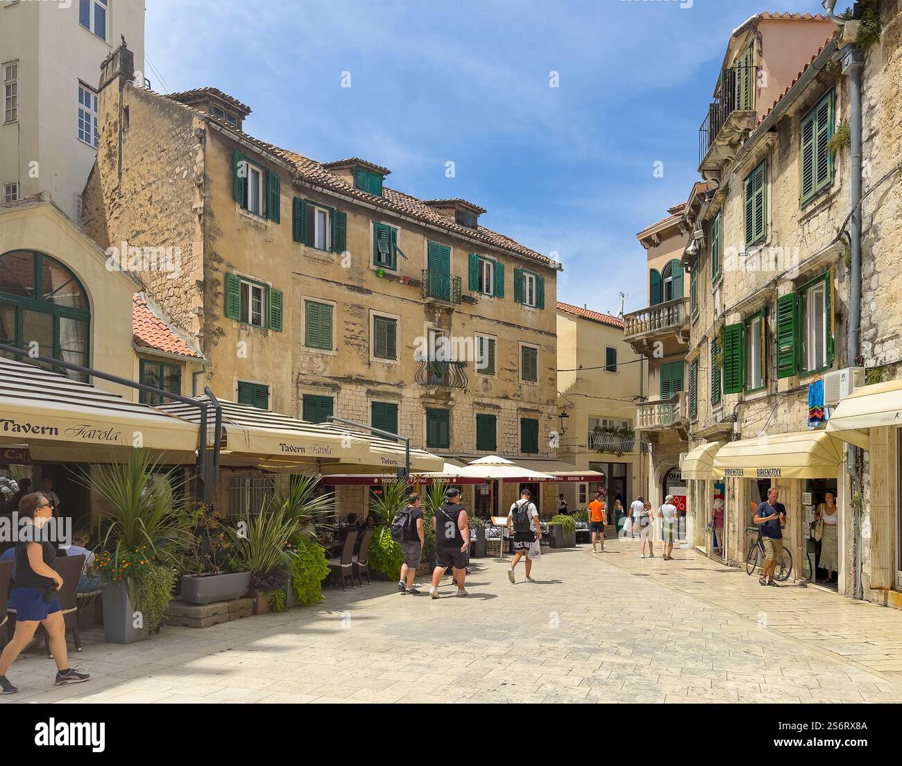 Split, Croatia - July 1, 2024: Historic downtown. Radic Brothers Square ...