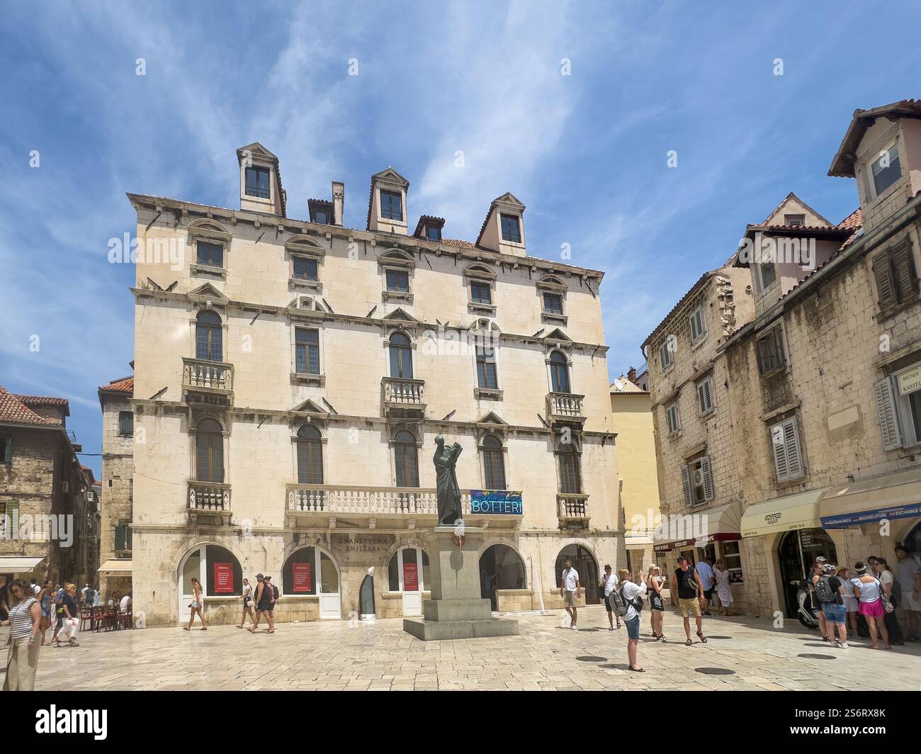 Split, Croatia - July 1, 2024: Historic downtown. Marko Marulic ...