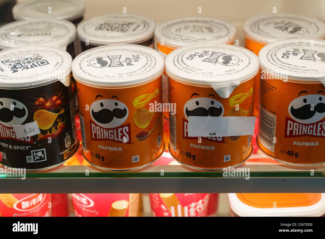 Minsk, Belarus - August 16, 2024: Colorful cans of Pringles in various ...