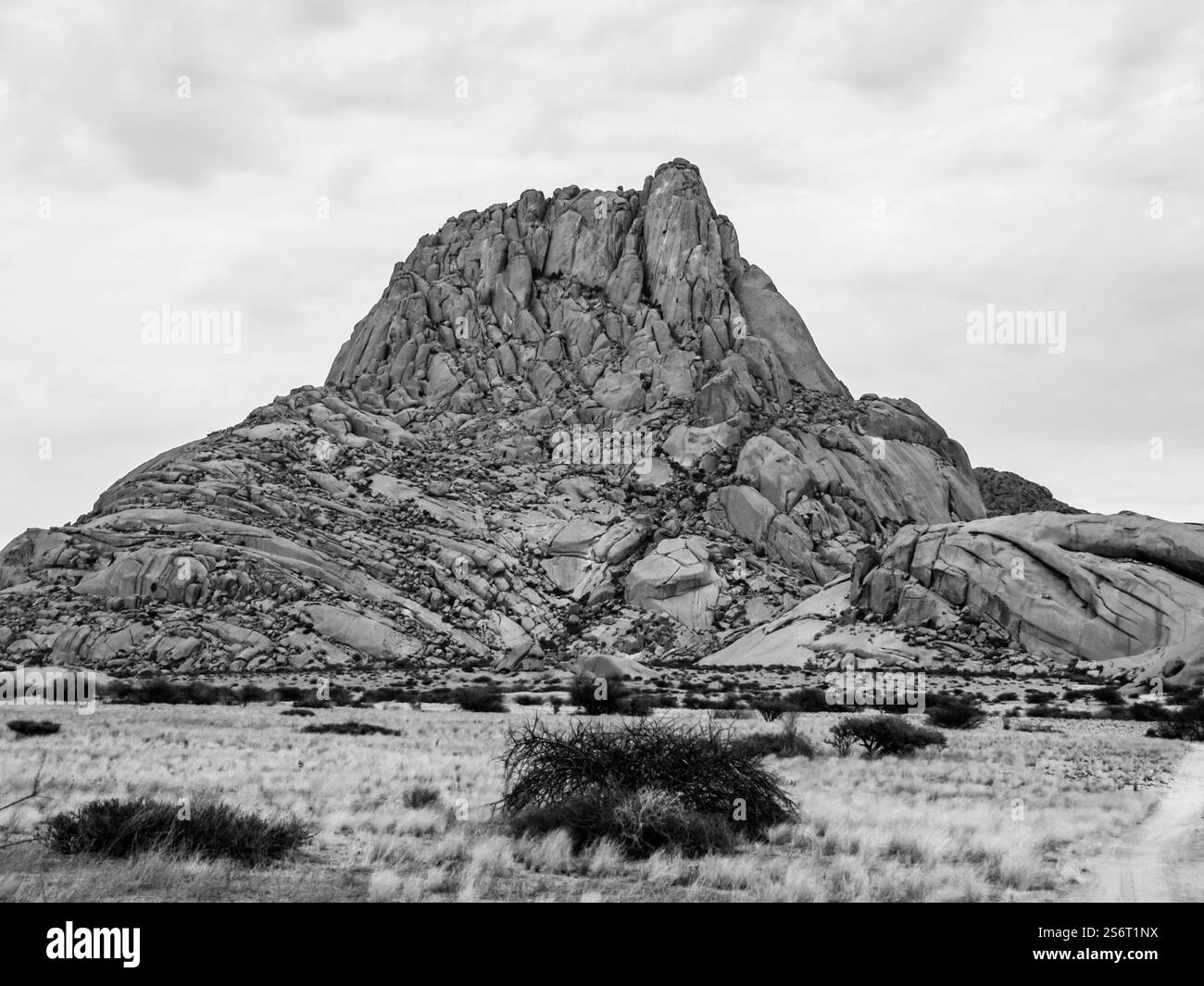 Spitzkoppe mountain - bald granite peak in Namibia. Black and white ...