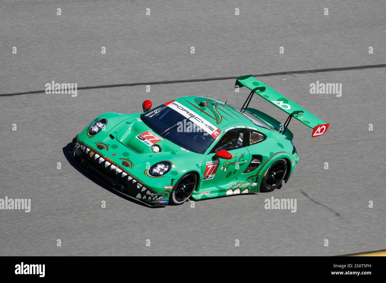 DAYTONA BEACH, FL - JANUARY 17: The #77 AO Racing Porsche 911 GT3 R ...