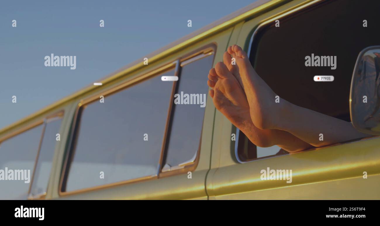 Feet sticking out of car window with social media notifications image ...