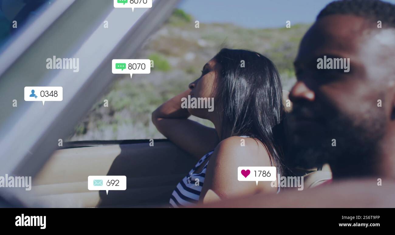 Social media notifications image over people driving in car. Technology ...