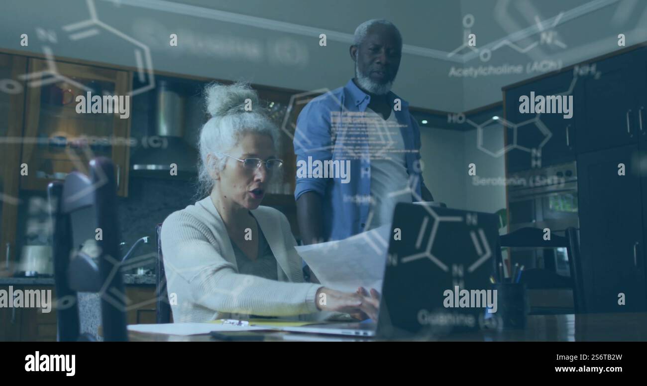 Chemical formulas and molecular structures image over people working on laptop Stock Photo - Alamy