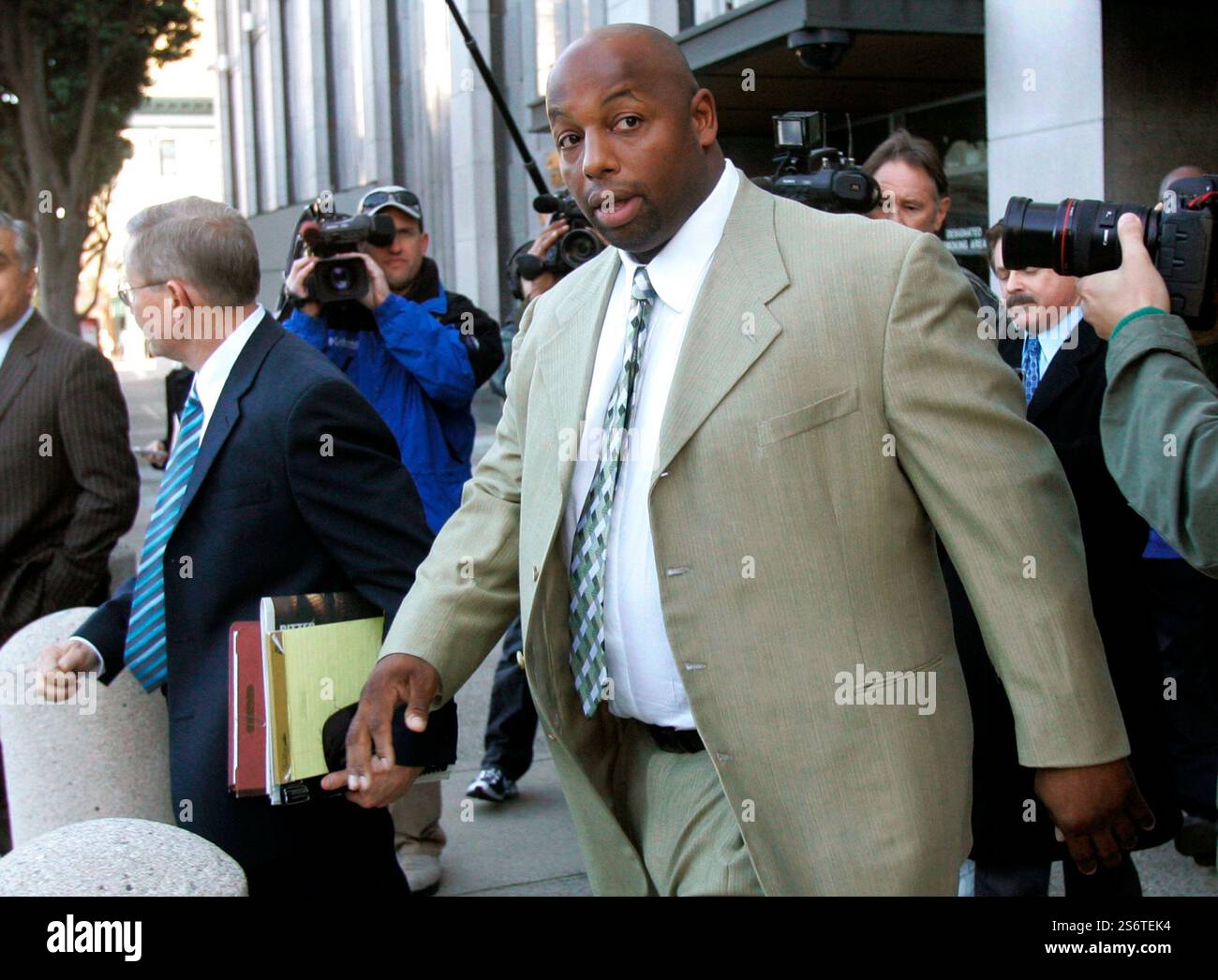 FILE - Former NFL football player Dana Stubblefield leaves a federal ...