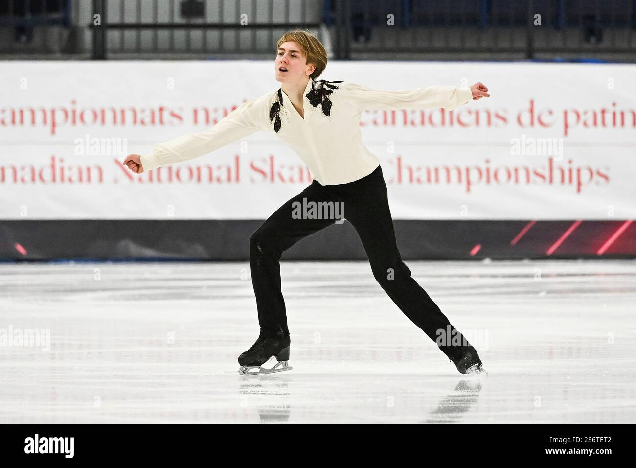 LAVAL, QC - JANUARY 17: Grayson Long (CAN) performs in the men short ...