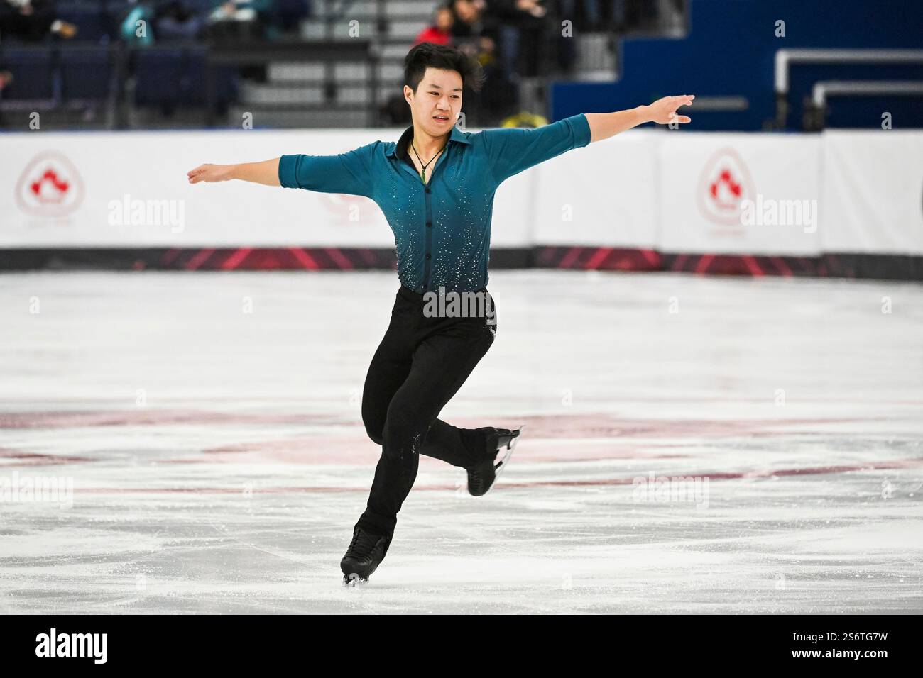 LAVAL, QC - JANUARY 17: Brian Chiem (CAN) performs in the men short ...