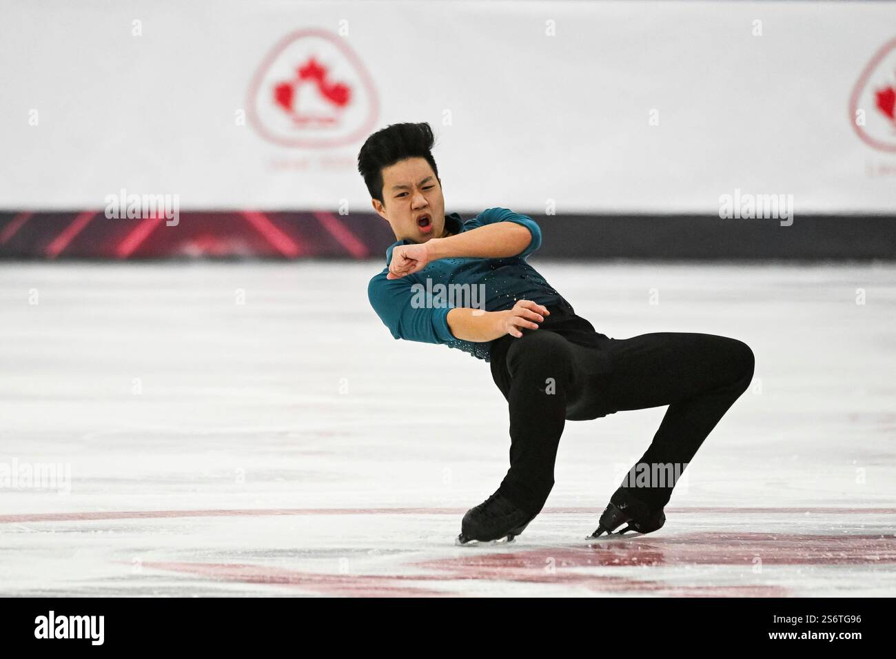 LAVAL, QC - JANUARY 17: Brian Chiem (CAN) performs in the men short ...