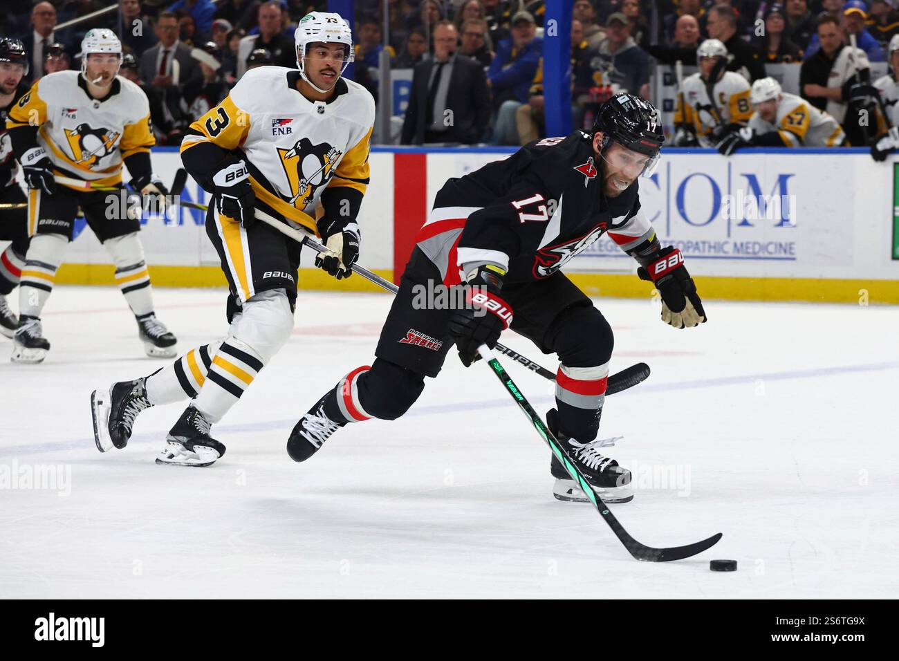 Buffalo Sabres left wing Jason Zucker (17) carries the puck past ...
