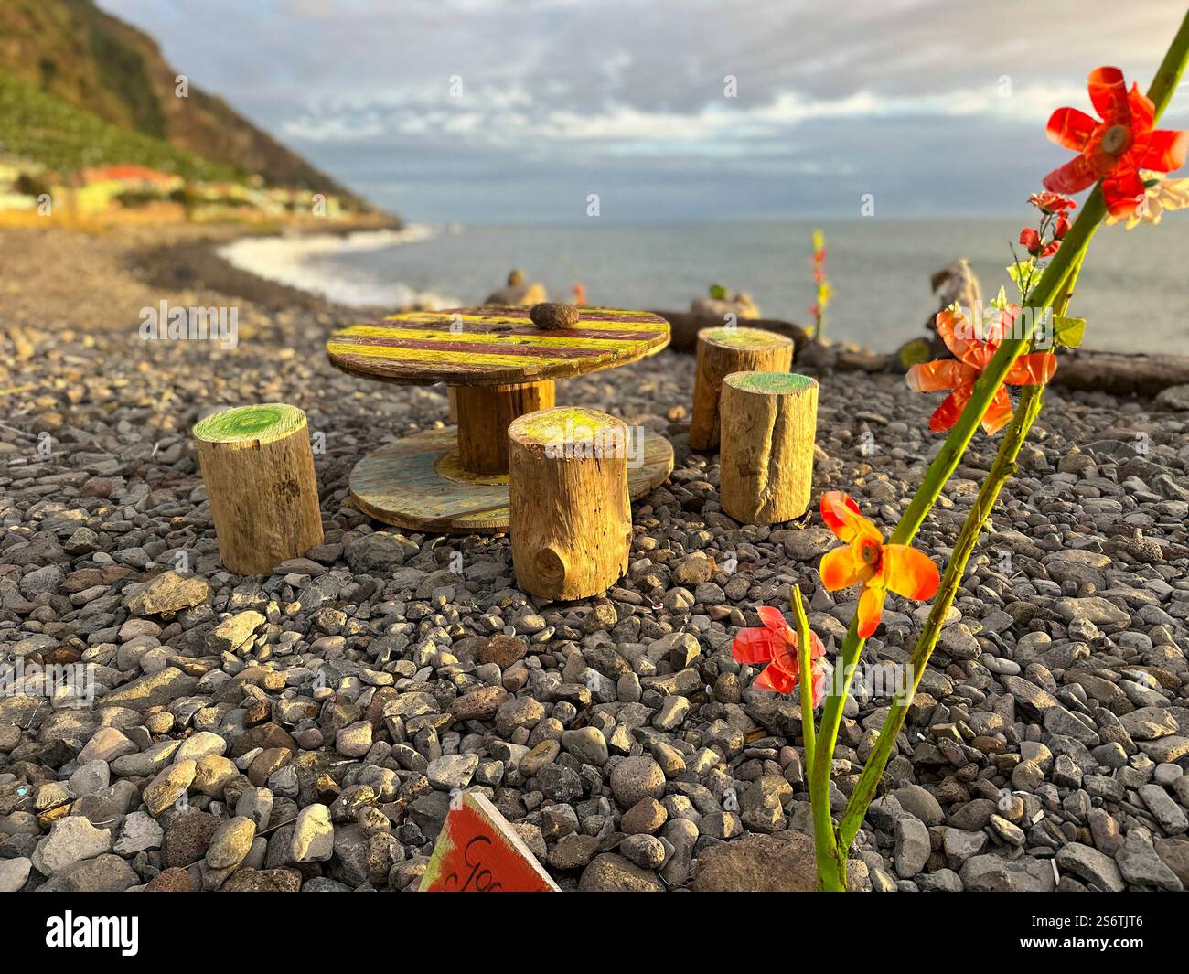 Portugal, Madeira Island. Madalena do Mar, table, recovery chair on the ...