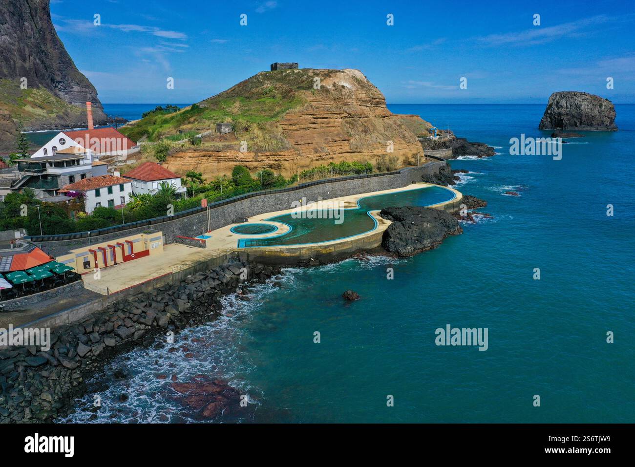 Portugal, Madeira Island. Porto da Cruz. Seawater pool filling at high ...