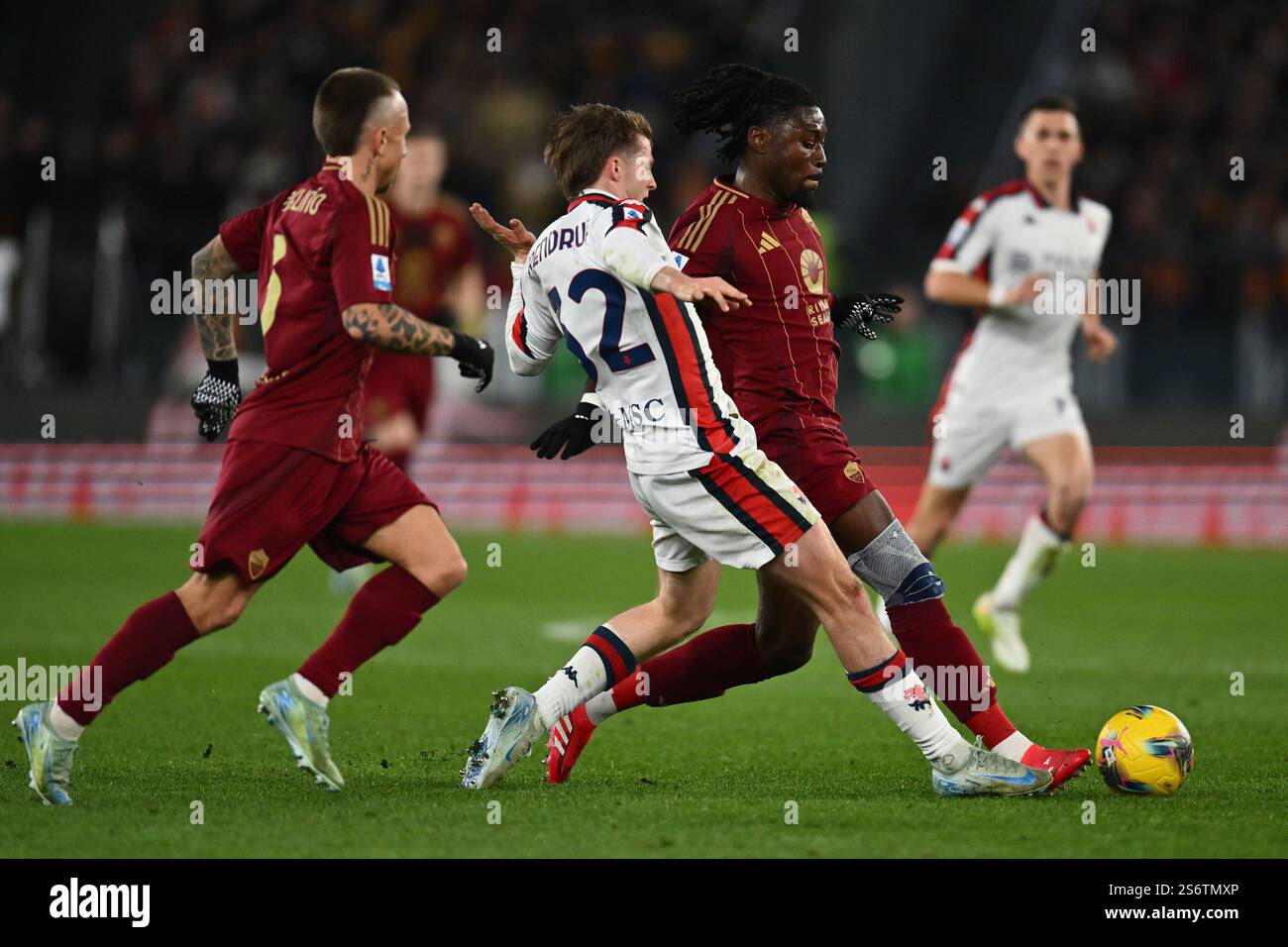 Morten Frendrup of Genoa F.C. and Manu Kone of A.S. Roma in action ...