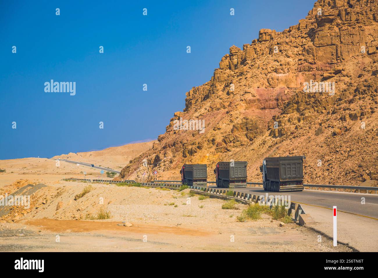 Jordan, Middle East, Dead Sea. Three identical trucks follow each other ...
