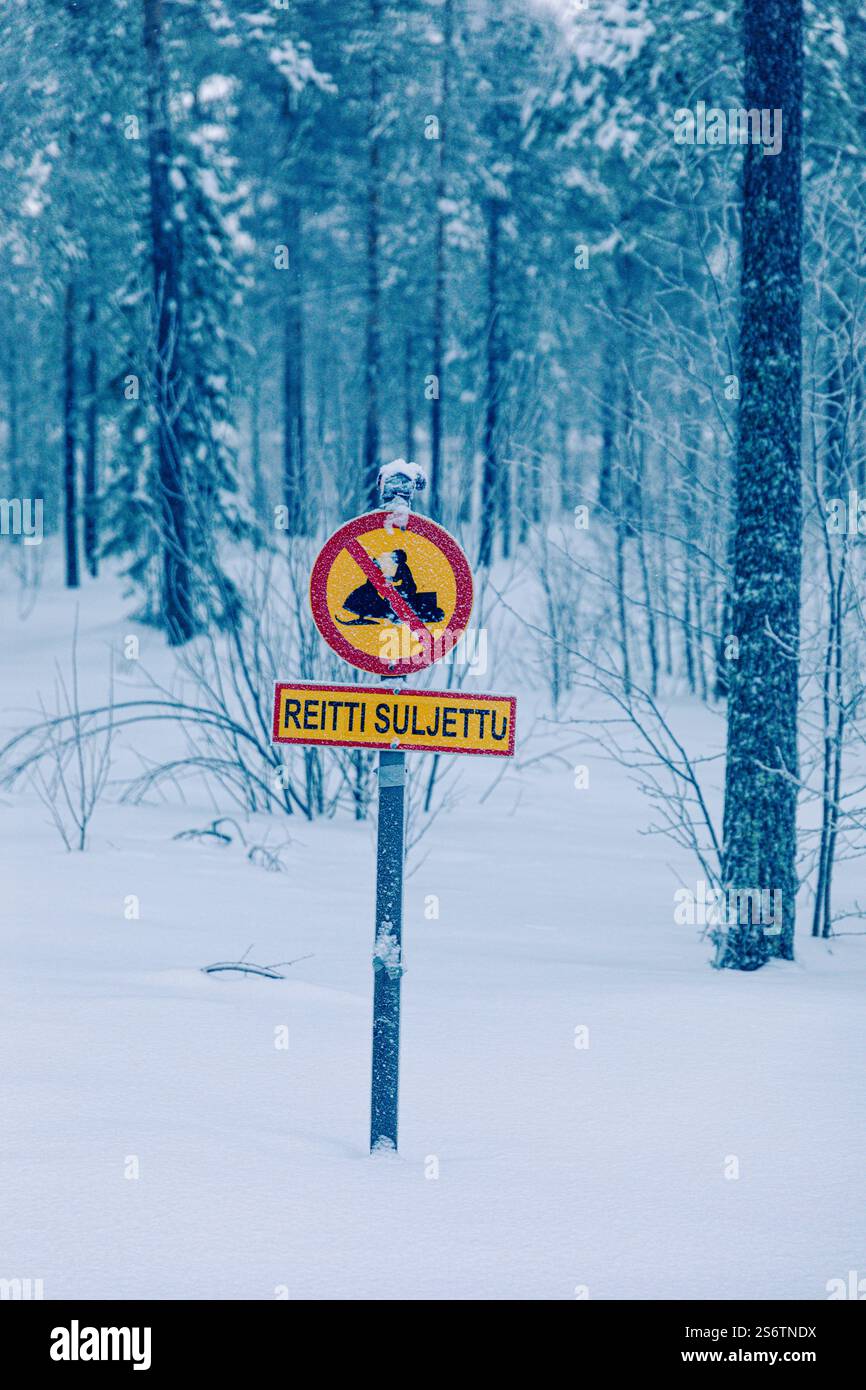 Scandinavia, Lapland, Finland, Signs in the forest prohibiting ...