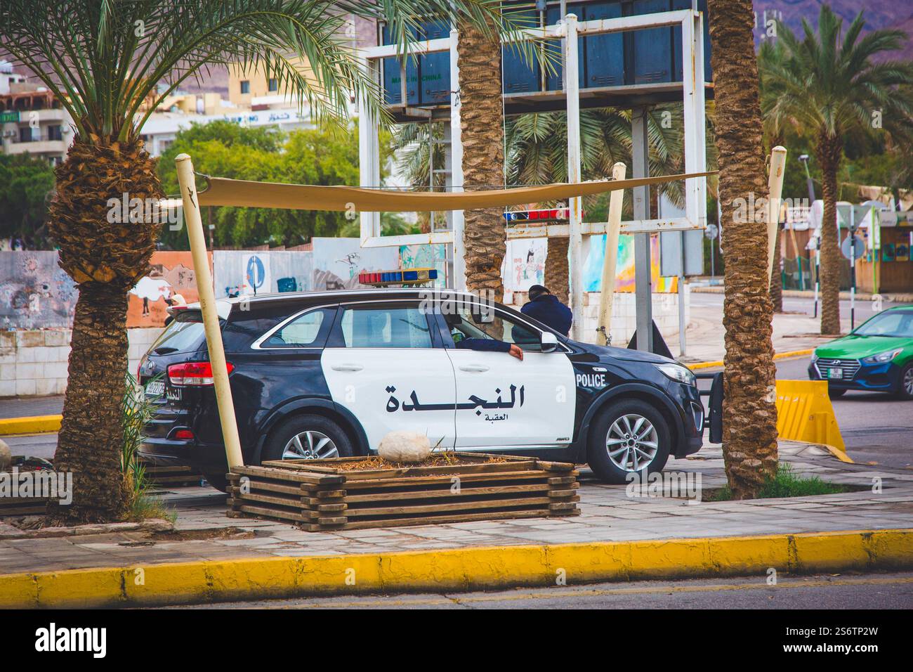 Middle East, Jordan, Aqaba police vehicle in city center Stock Photo ...