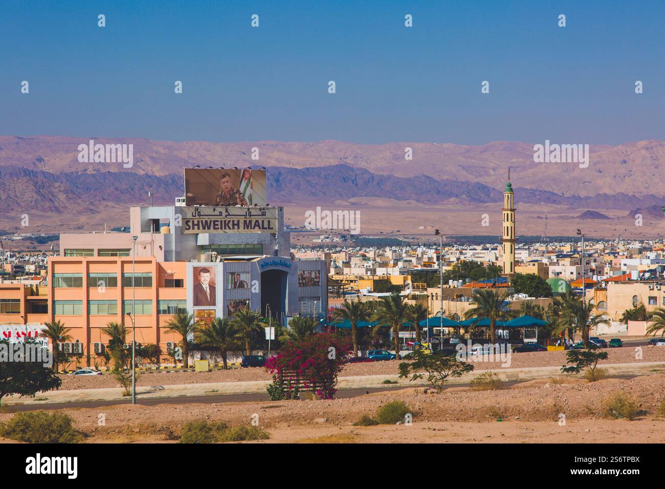 Middle East, Jordan, Aqaba. Shweikh Mall. Giant portrait of King ...