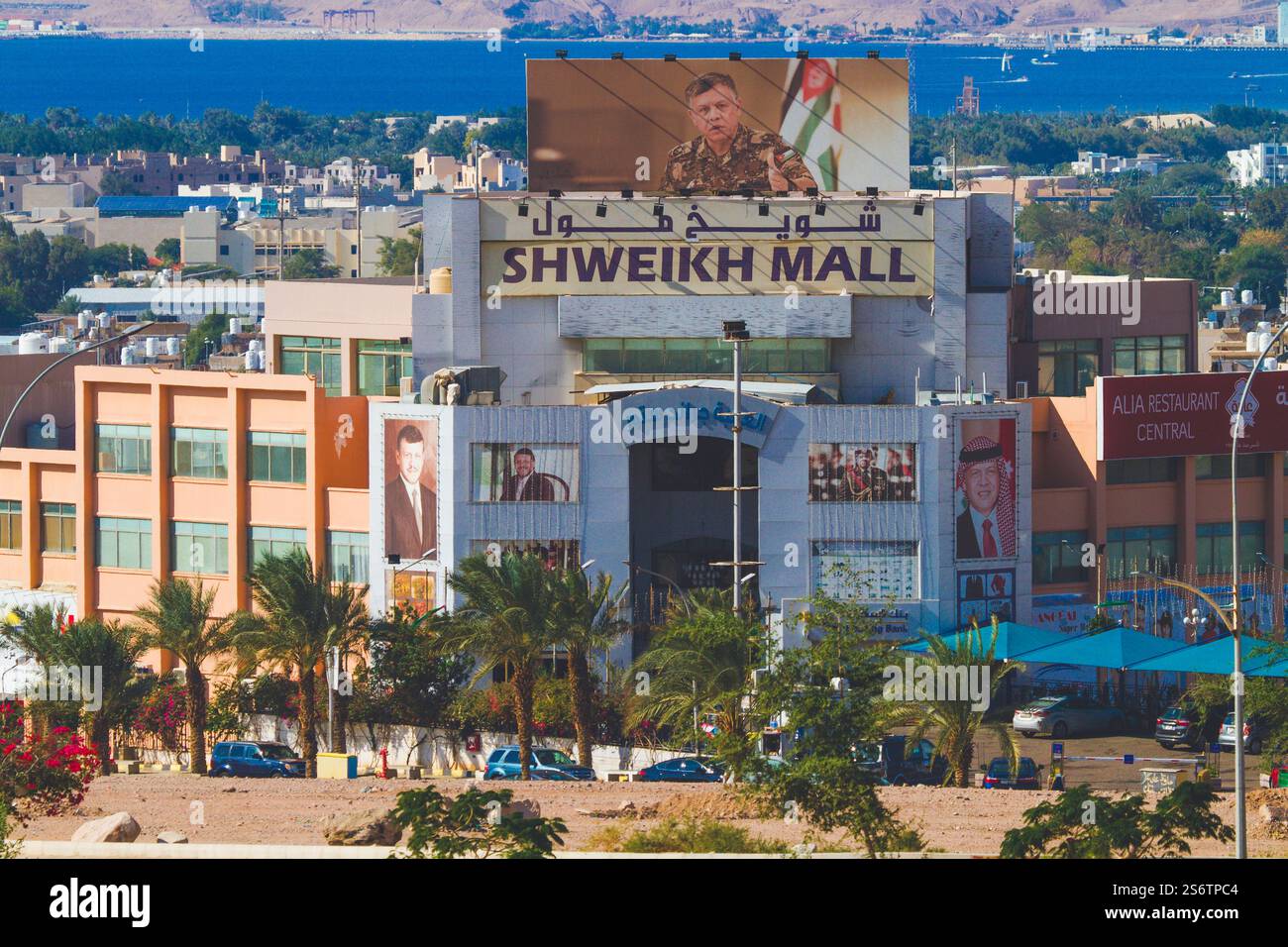 Middle East, Jordan, Aqaba. Shweikh Mall. Giant portrait of King ...