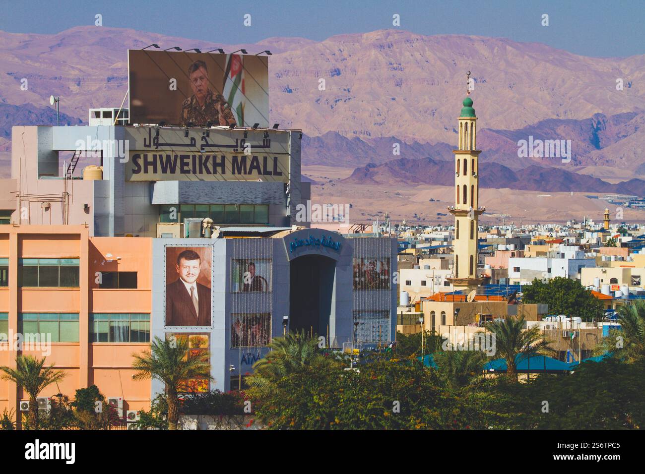 Middle East, Jordan, Aqaba. Shweikh Mall. Giant portrait of King ...