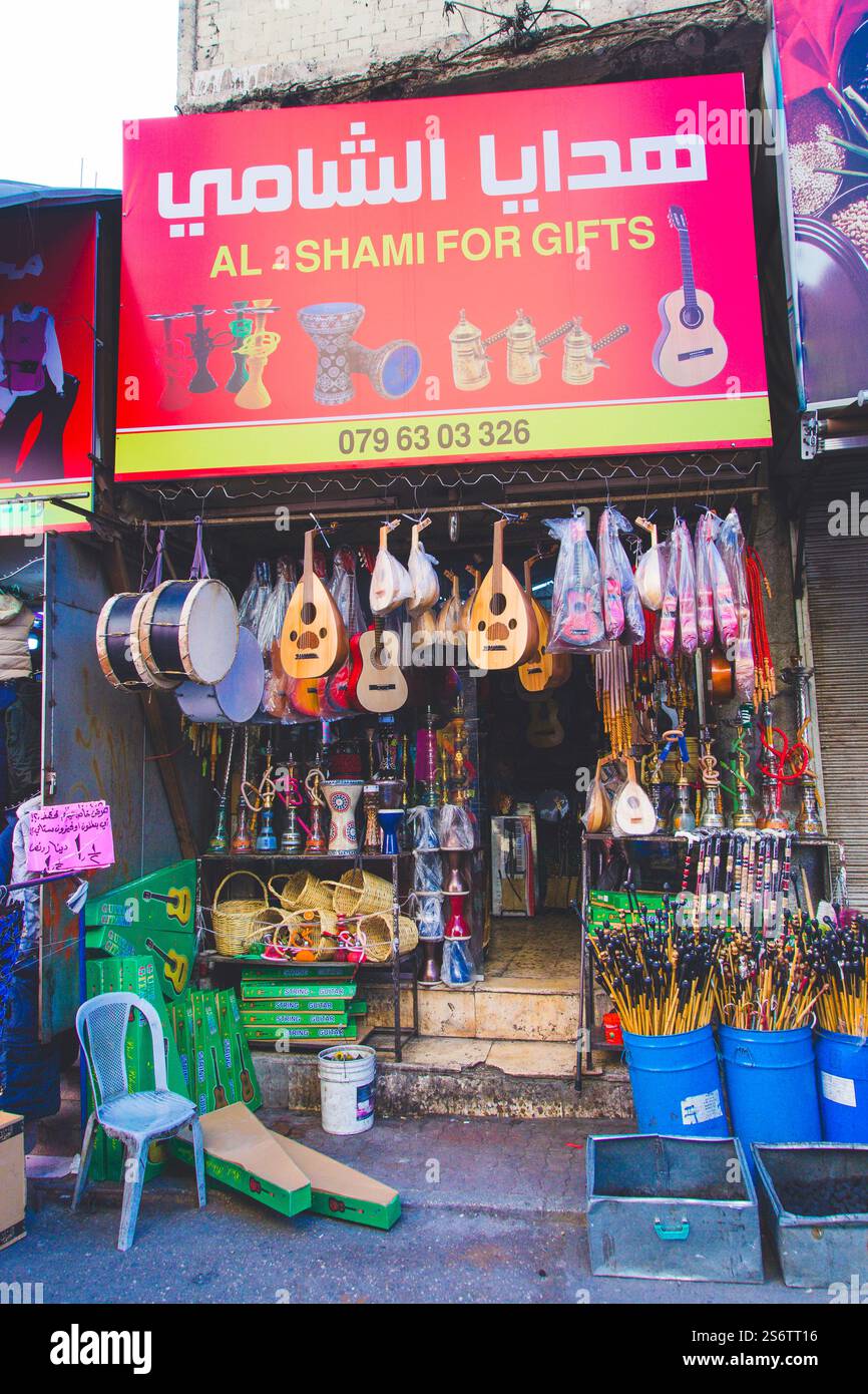 Jordan, Middle East, Amman. Al Balad district. Musical instrument store ...