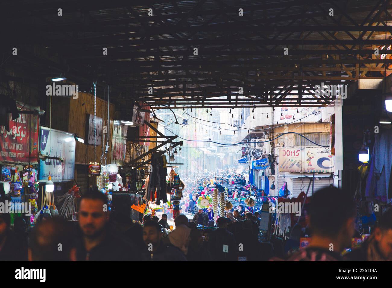 Jordan, Middle East, Amman. Al Balad district. Crowd of men in the ...