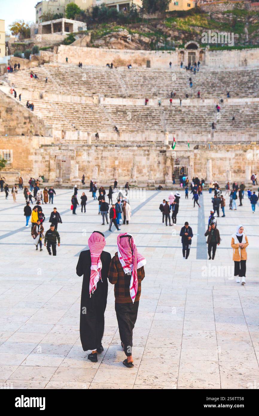 Jordan, Middle East, Amman, ancient roman theater, two young Jordanians ...