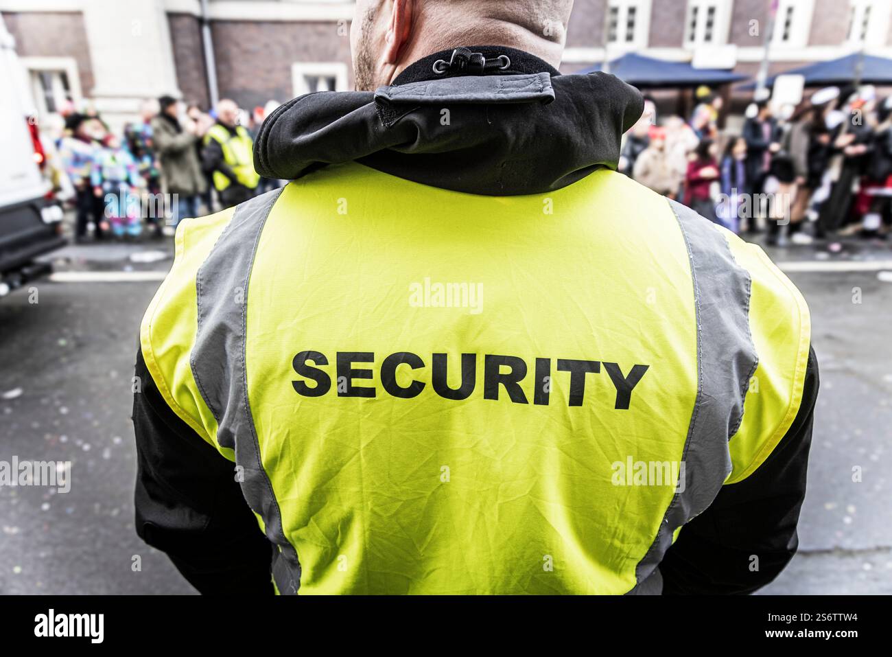 Security guard from behind Stock Photo - Alamy