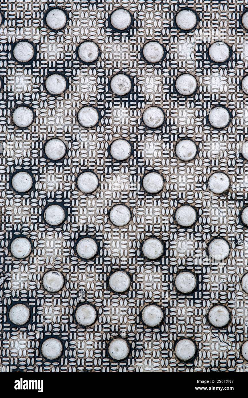 France, Close-up on a podotactile paving stone for guiding the blind ...