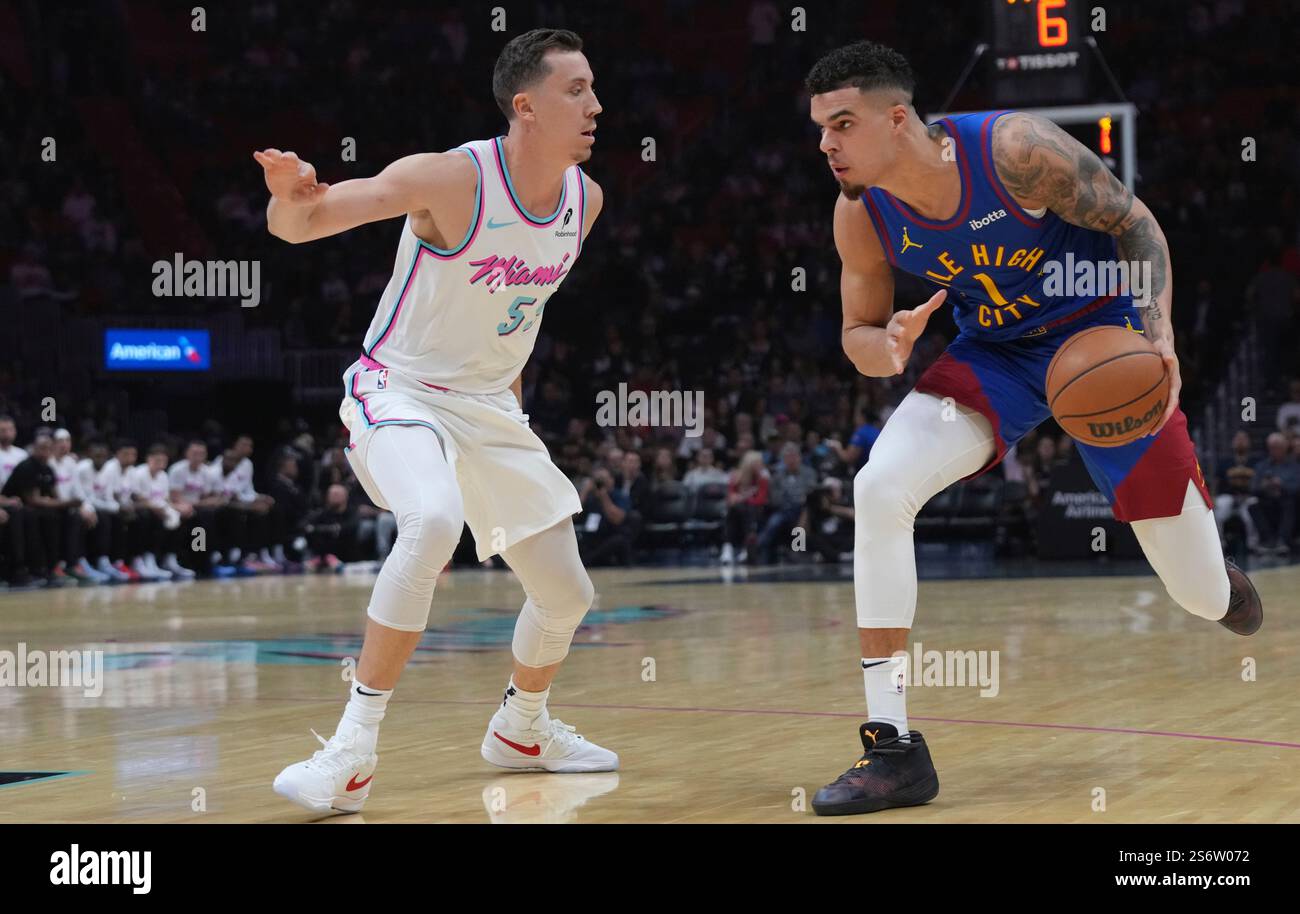 Miami Heat forward Duncan Robinson defends Denver Nuggets forward ...