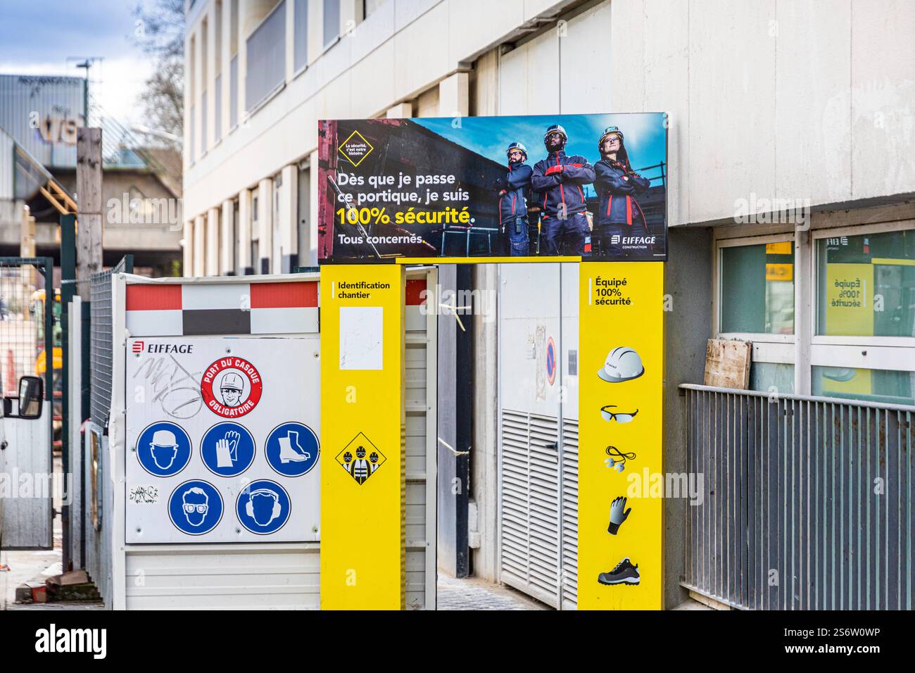 Site entrance with safety poster and pictograms Stock Photo - Alamy