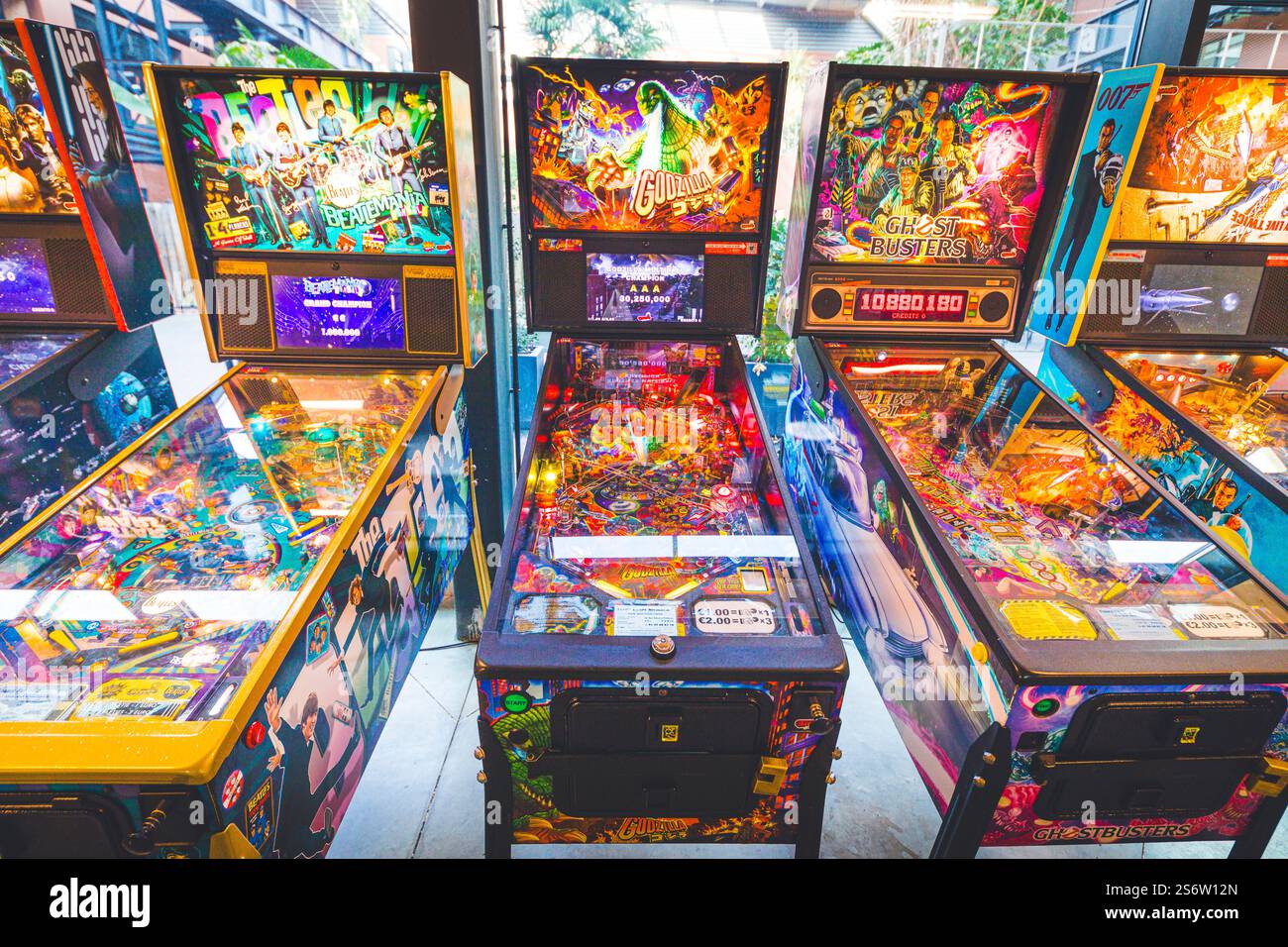 Games room with pinball machines Stock Photo - Alamy