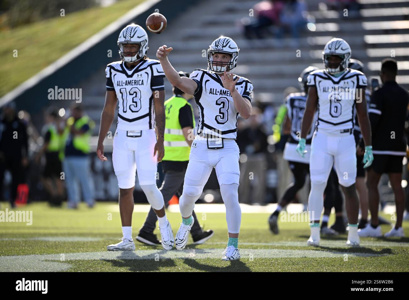 Team Unstoppable quarterbacks Malik Washington (13) and Derek Zammit (3 ...