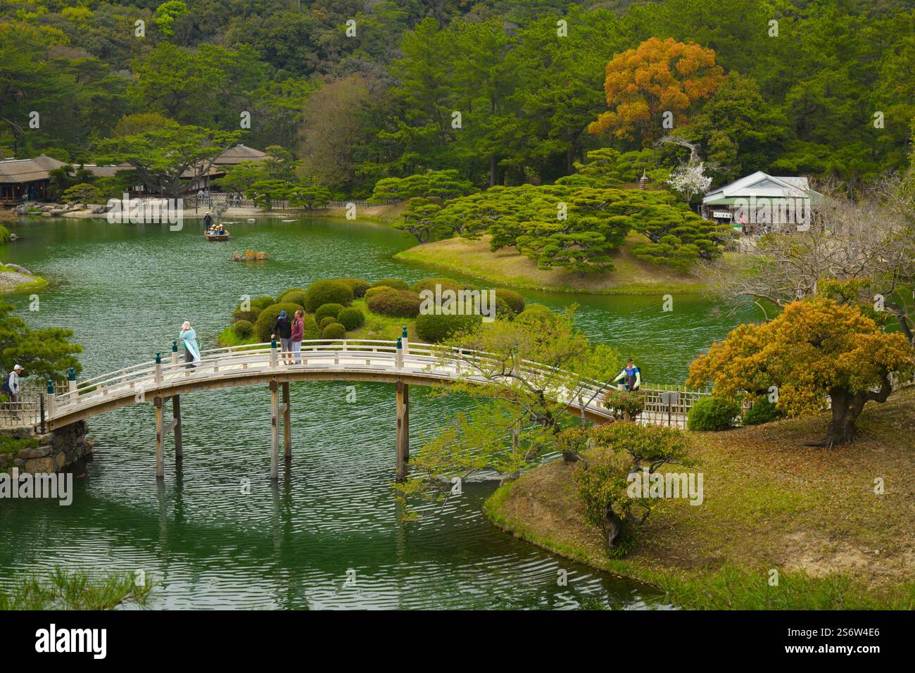 Japan, Shikoku, Takamatsu, Ritsurin-koen, garden, bridge, people Stock ...