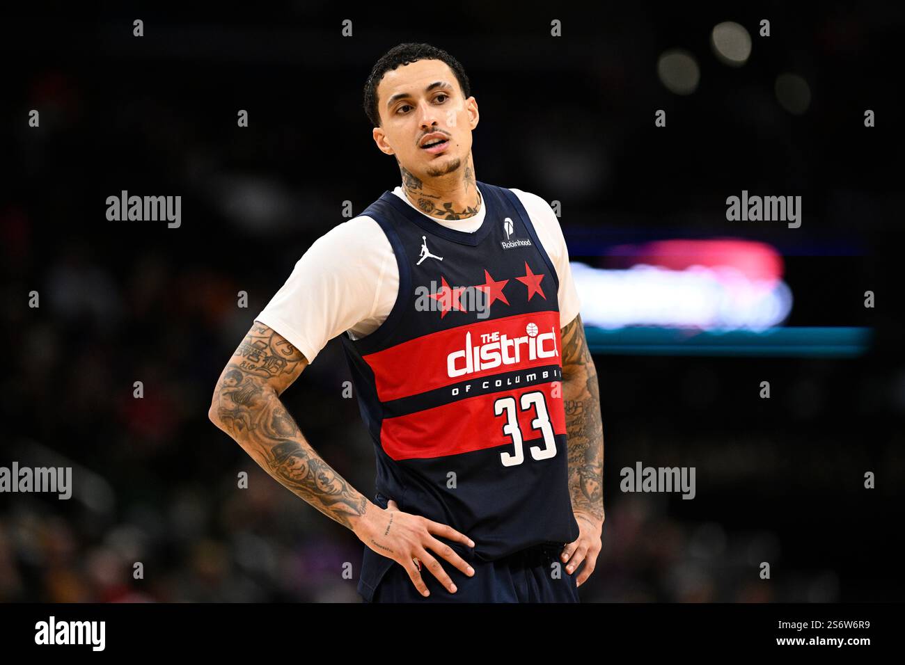 Washington Wizards forward Kyle Kuzma (33) looks on during the second ...
